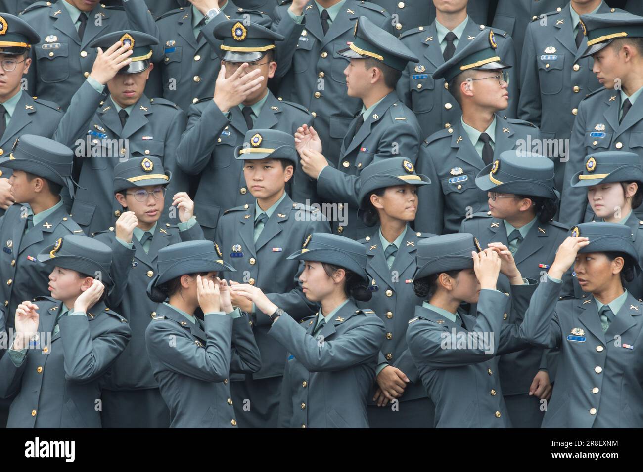 Military academy graduates attend their a graduation ceremony in Taipei ...