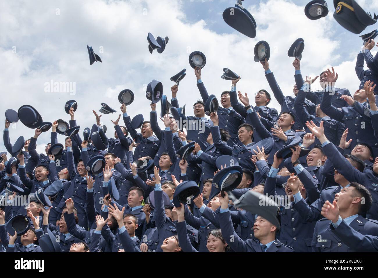 Military academy graduates attend their a graduation ceremony in Taipei ...