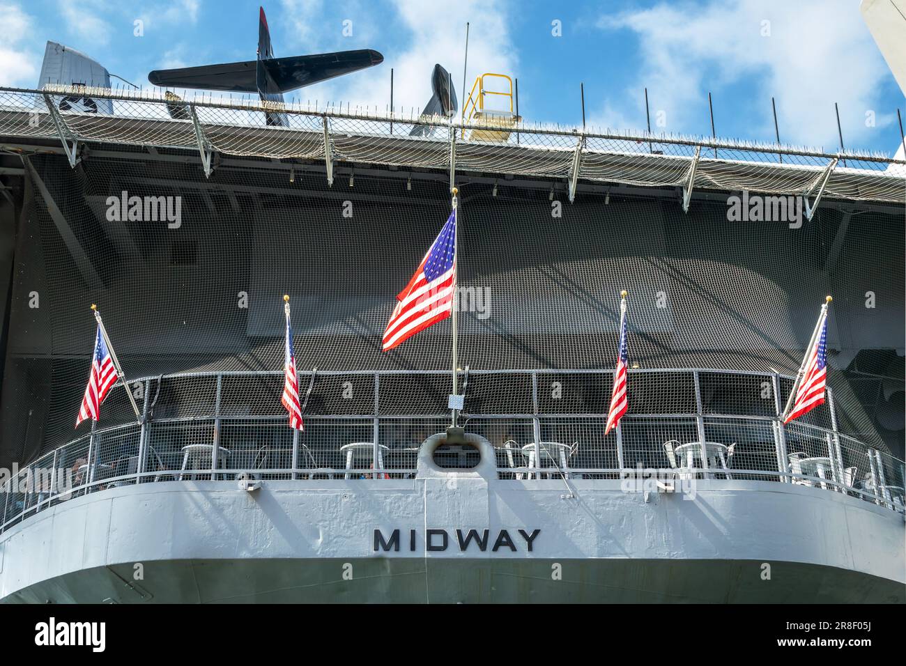 American flags at the stern of the USS Midway in San Diego, California ...