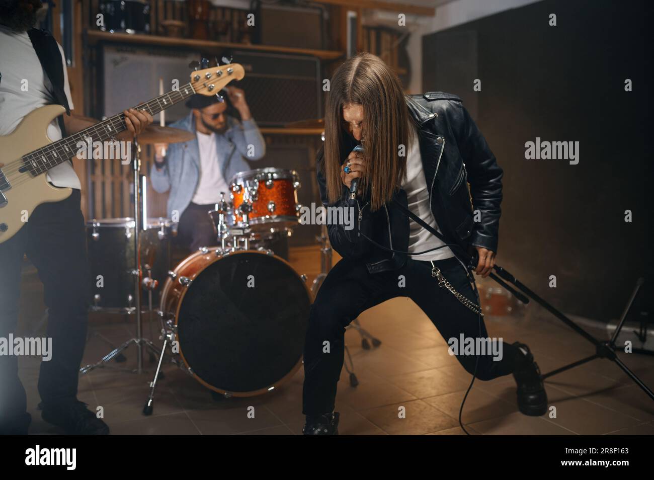 Young metal band in rehearsal hi-res stock photography and images - Alamy