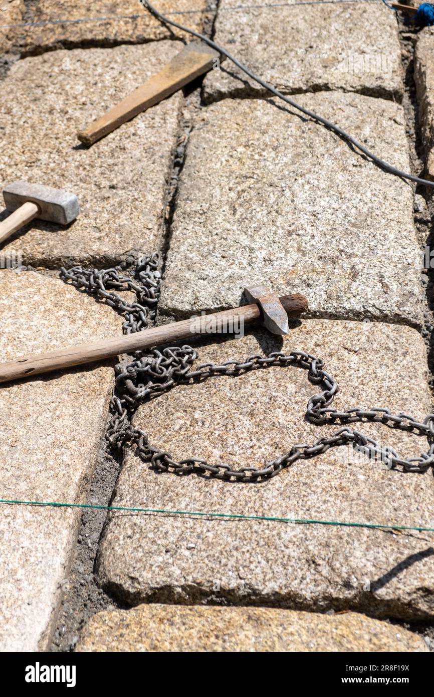 tools for stone masonry work with granite ashlars Stock Photo - Alamy