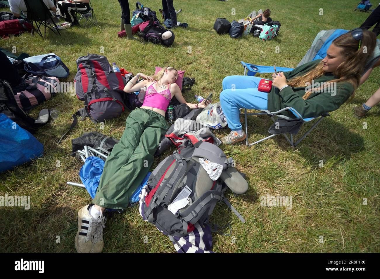 Festivalgoers Lucy Robbins (centre) and Ella Block (right) both from ...