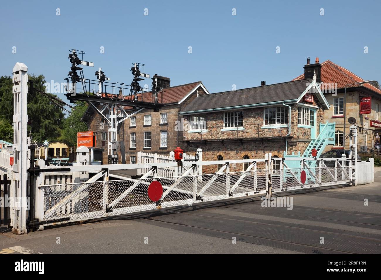 Level crossing gates, semaphore signal gantry and signal box at ...