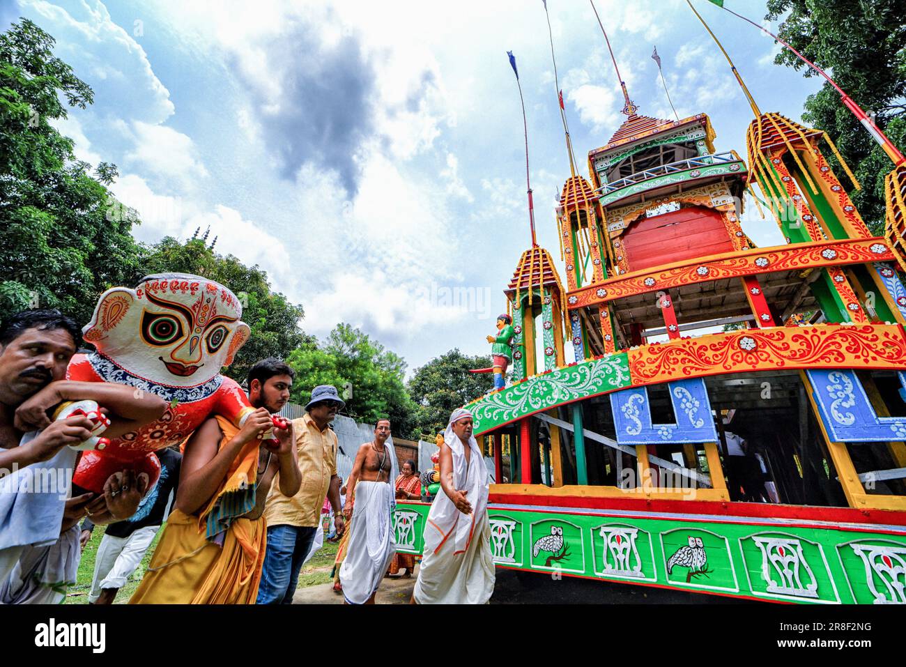 Guptipara, India. 20th June, 2023. Hindu devotees seen carrying an Idol ...