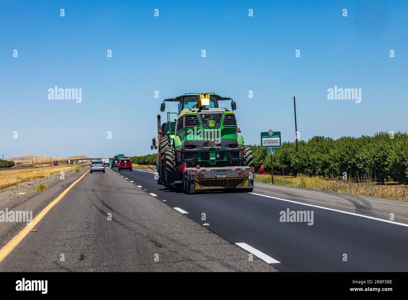 A Wide Load of a piece of John Deere equipment on Interstate 5 near ...