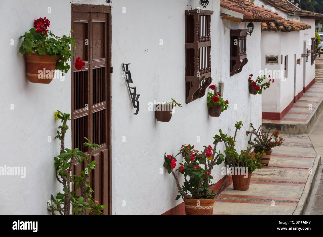 street view of traditional colonial town in Colombia, South America ...
