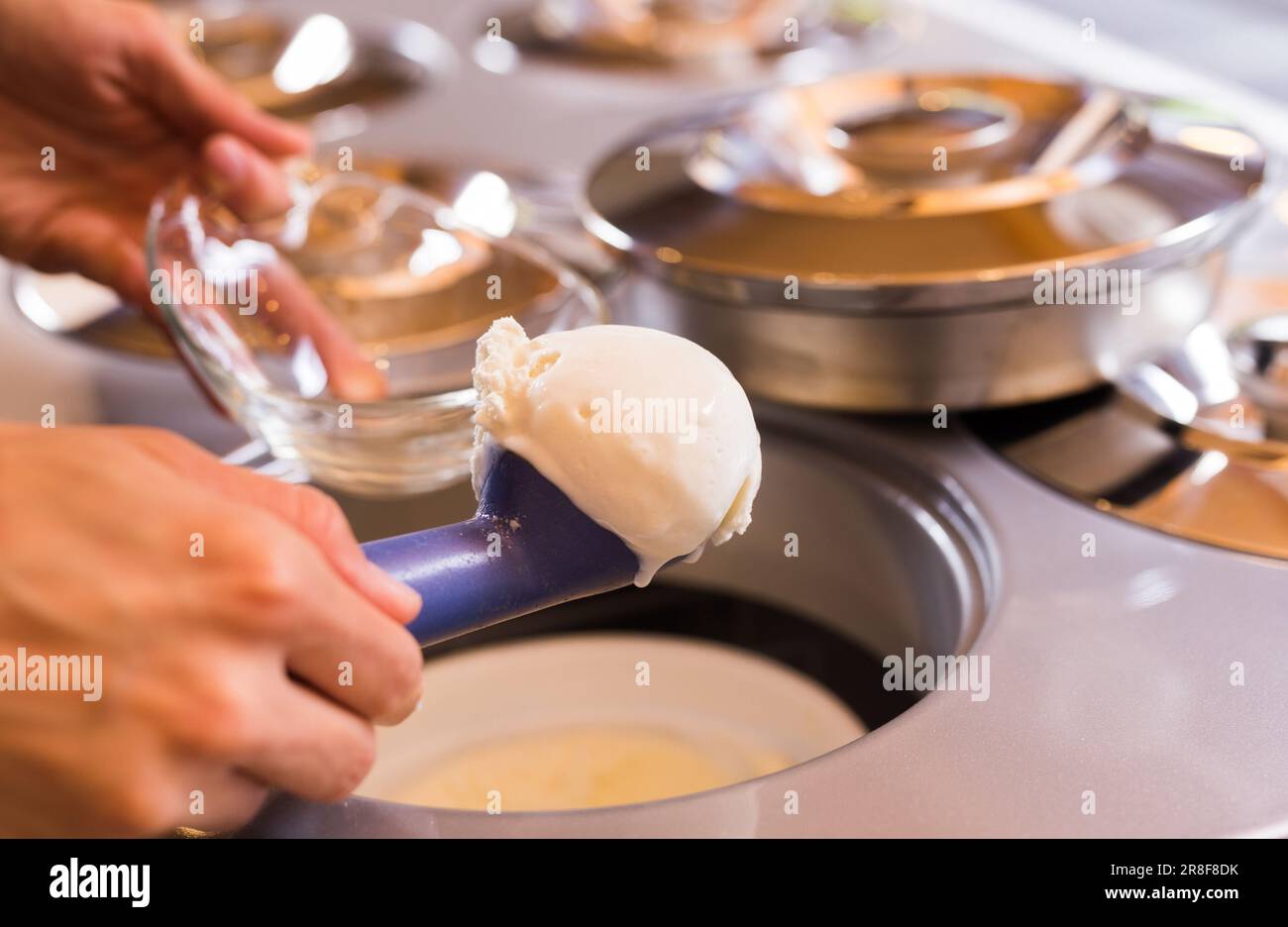 Ball of vanilla ice cream in ice cream razor in cafe Stock Photo - Alamy