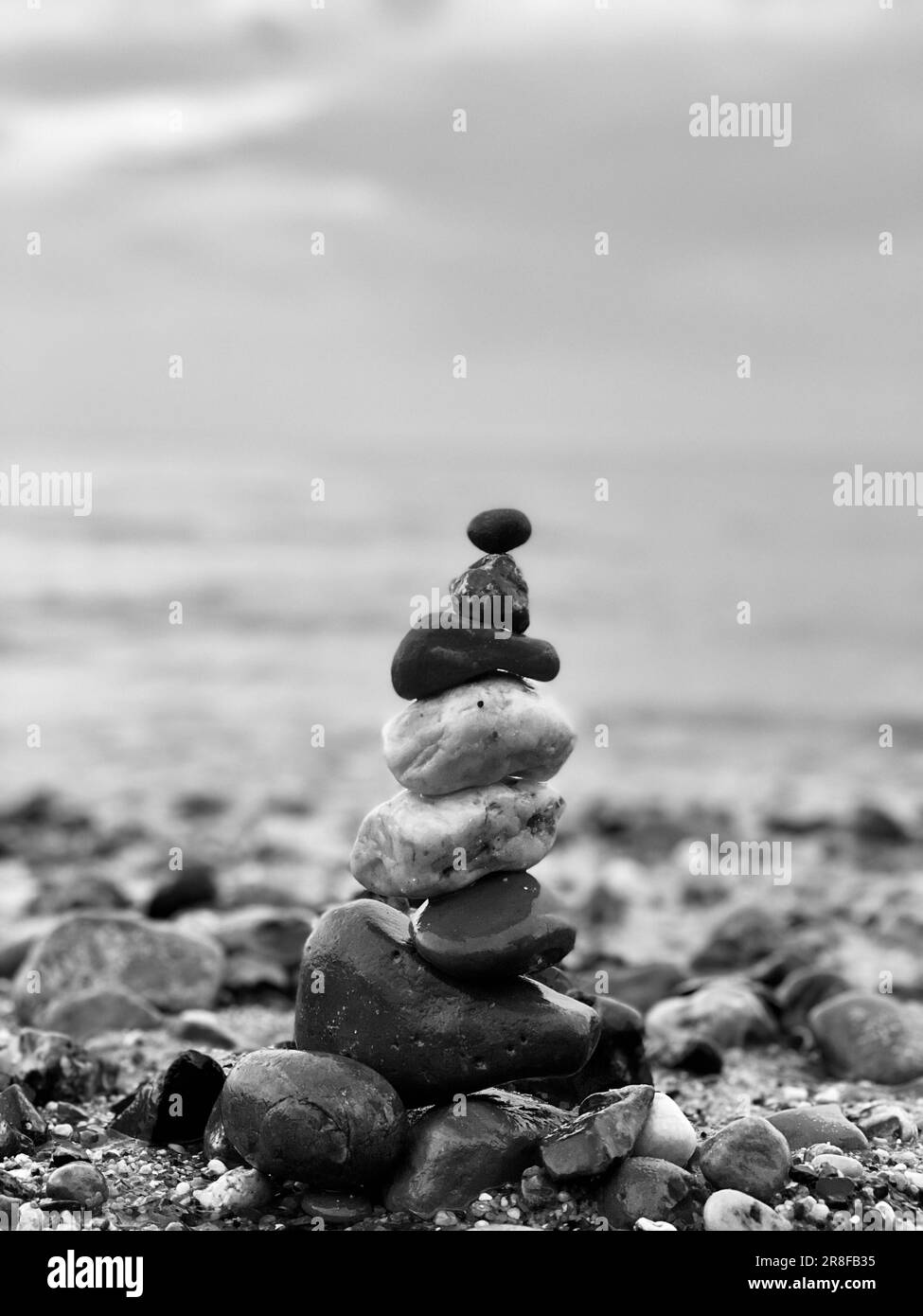 Pebble sandy beach Black and White Stock Photos & Images - Alamy