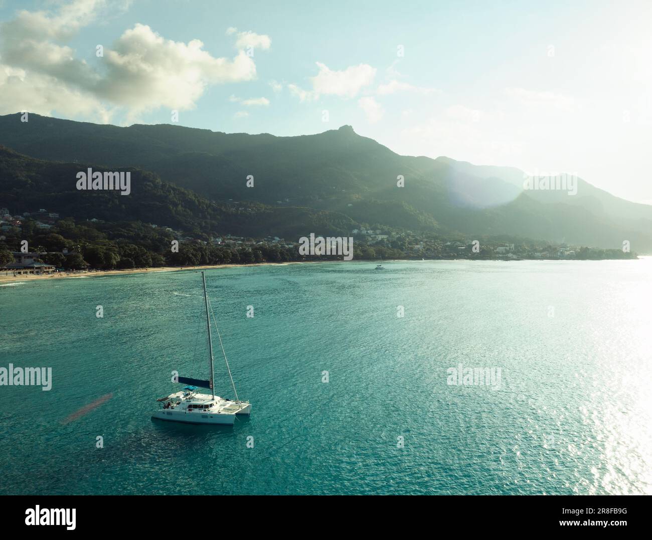 Catamaran Sailing in the Indian Ocean at Sunrise Stock Photo - Alamy