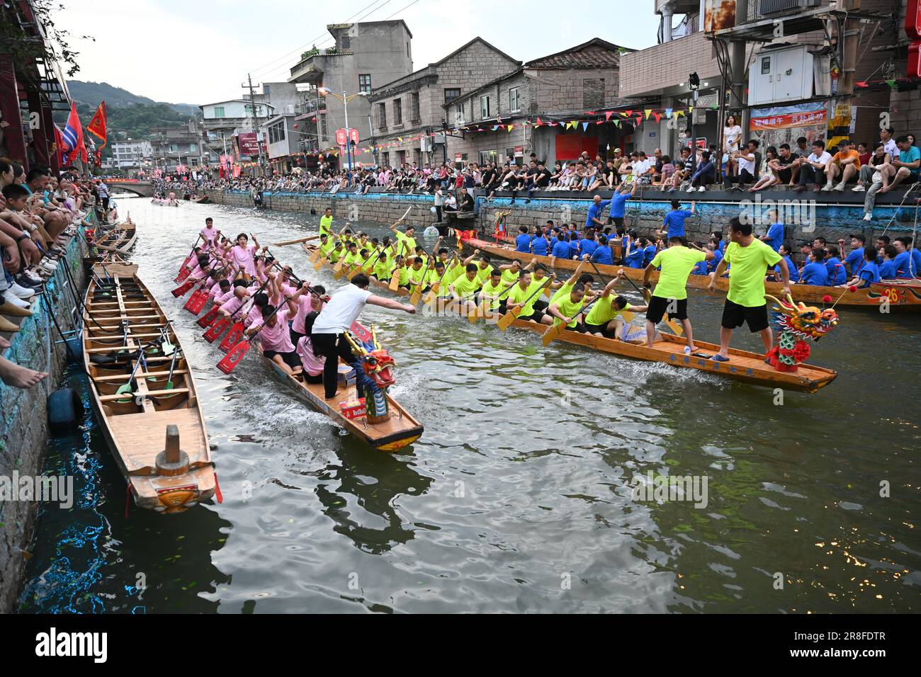 FUZHOU, June 21, 2023 (Xinhua) -- A nighttime dragon boat race is held ...