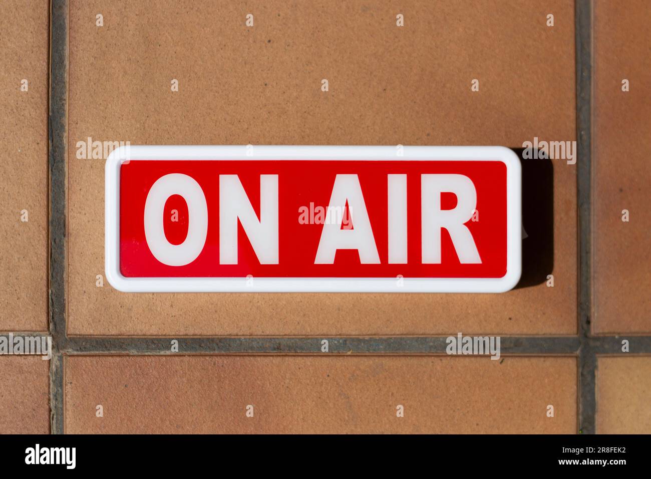 billboard signboard or indicator sign with the word "on air" written in ...