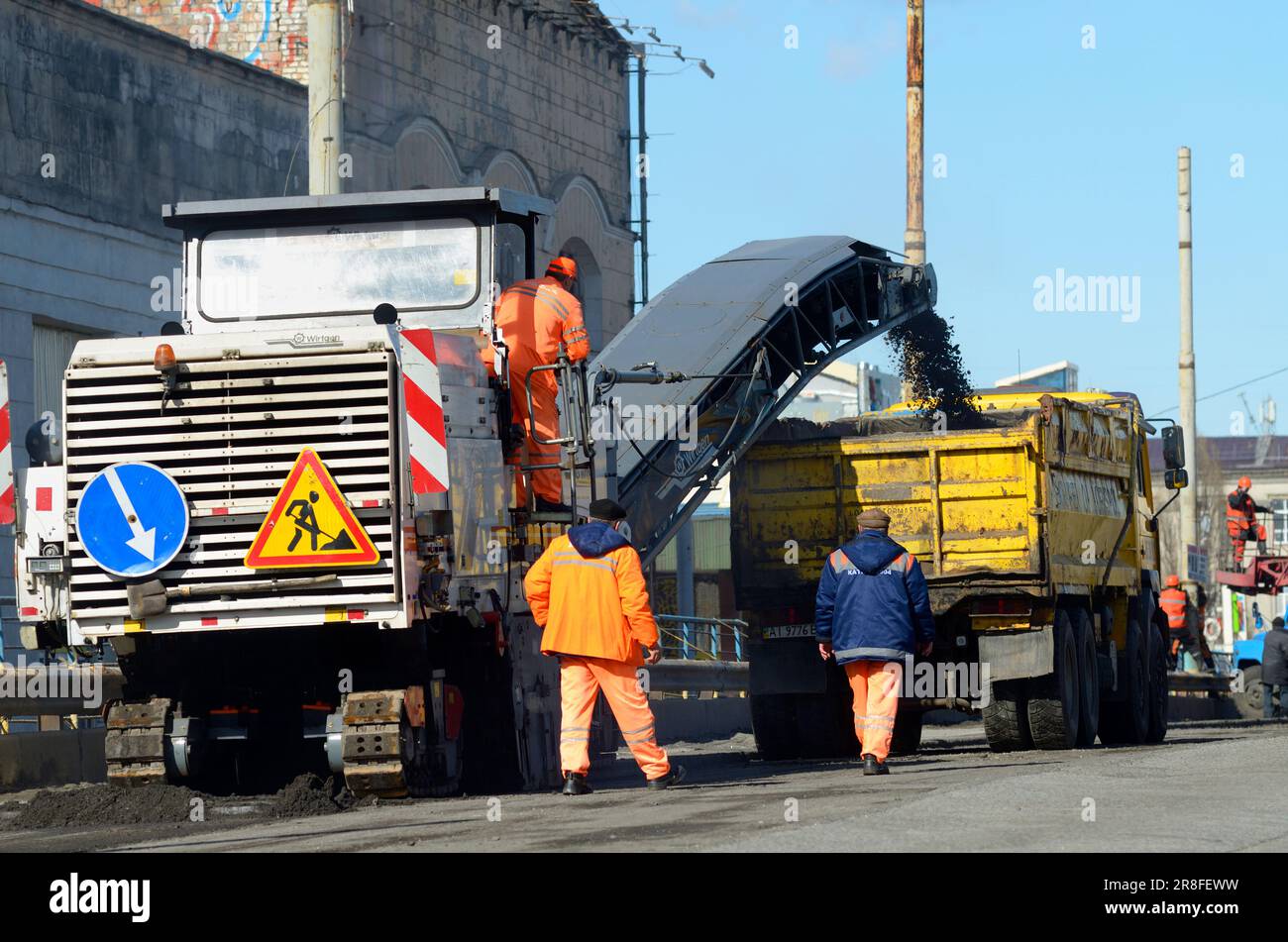 Road profiling: a pavement profiler Wirtgen working removing asphalt ...