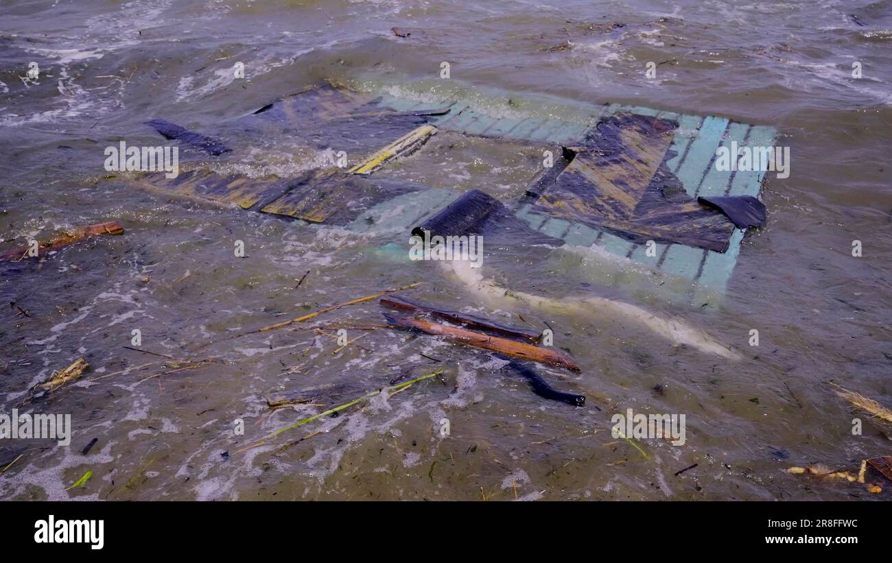 Part of wall of house floats near shore, floating debris has reached ...
