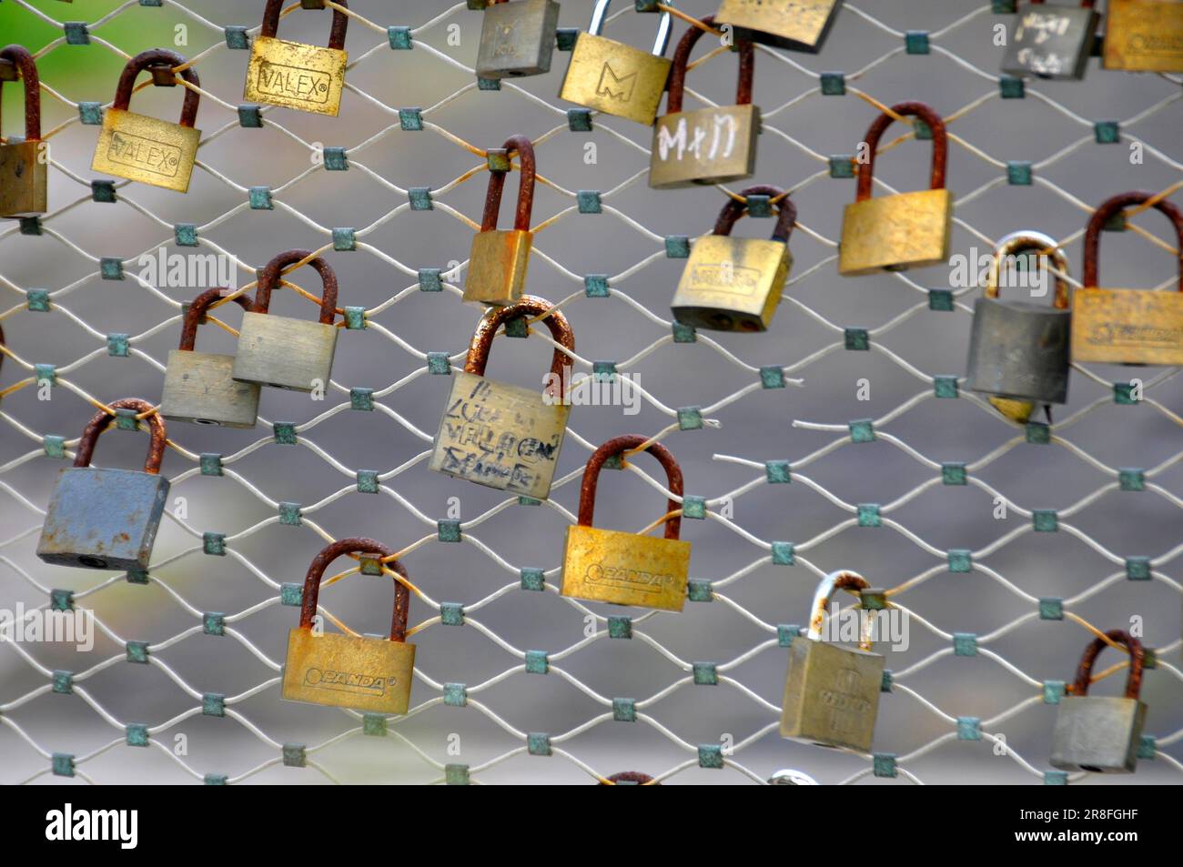 Friendship Locks on a Fence, Suspension Lock, Love Lock Stock Photo - Alamy