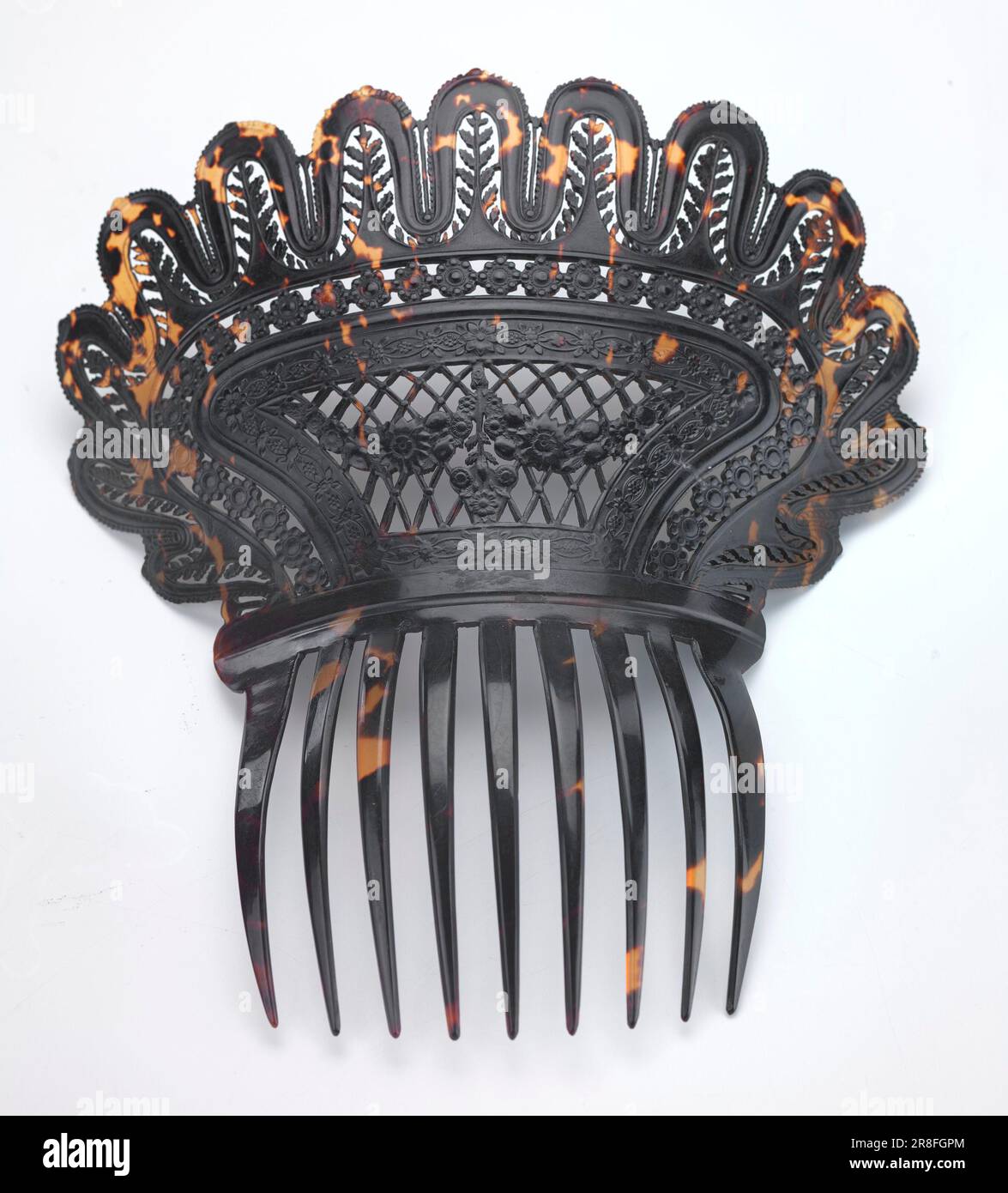 Tortoise shell comb hi-res stock photography and images - Alamy