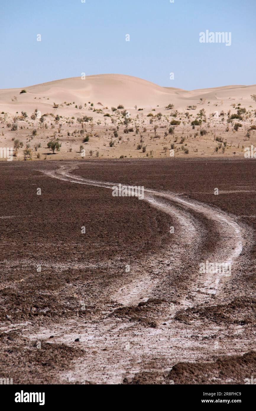 Lonely desert track in the Karakum Turkmenistan Stock Photo - Alamy