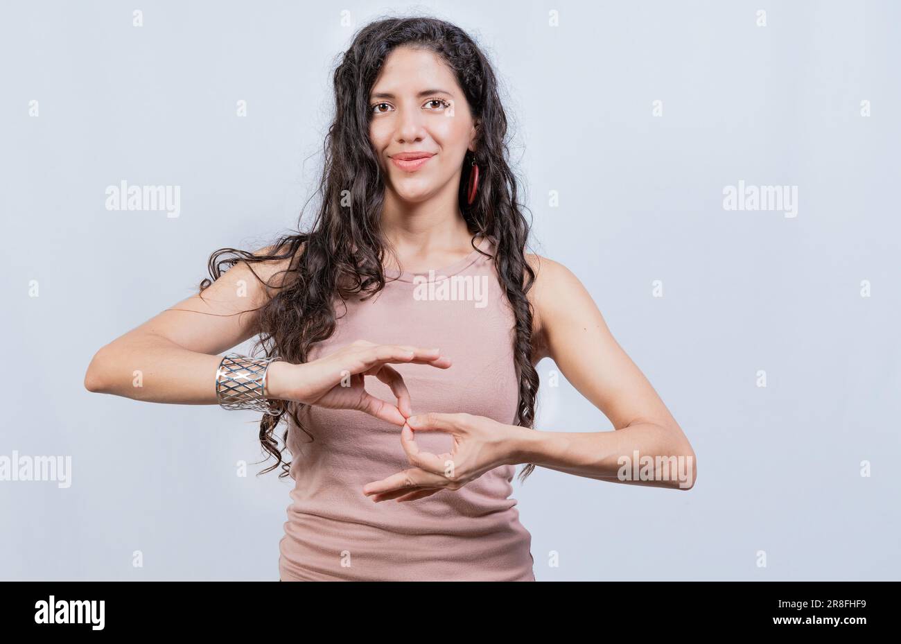 People speaking in sign language isolated. Young woman gesturing in ...