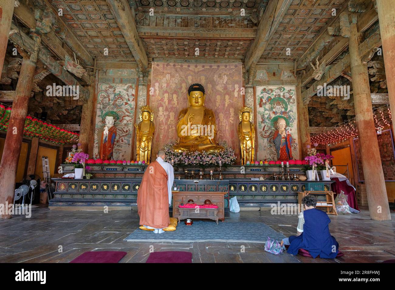 Gyeongju, South Korea - June 2, 2023: A monk praying in the Bulguksa ...
