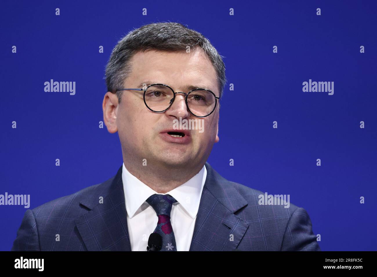 Ukraine's Foreign Minister Dmytro Kuleba addresses the opening session ...