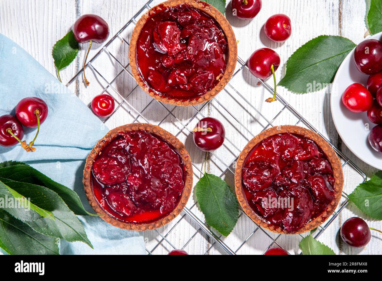 Cherry dessert tartlets. Mini tarts with cream filling and cherry ...