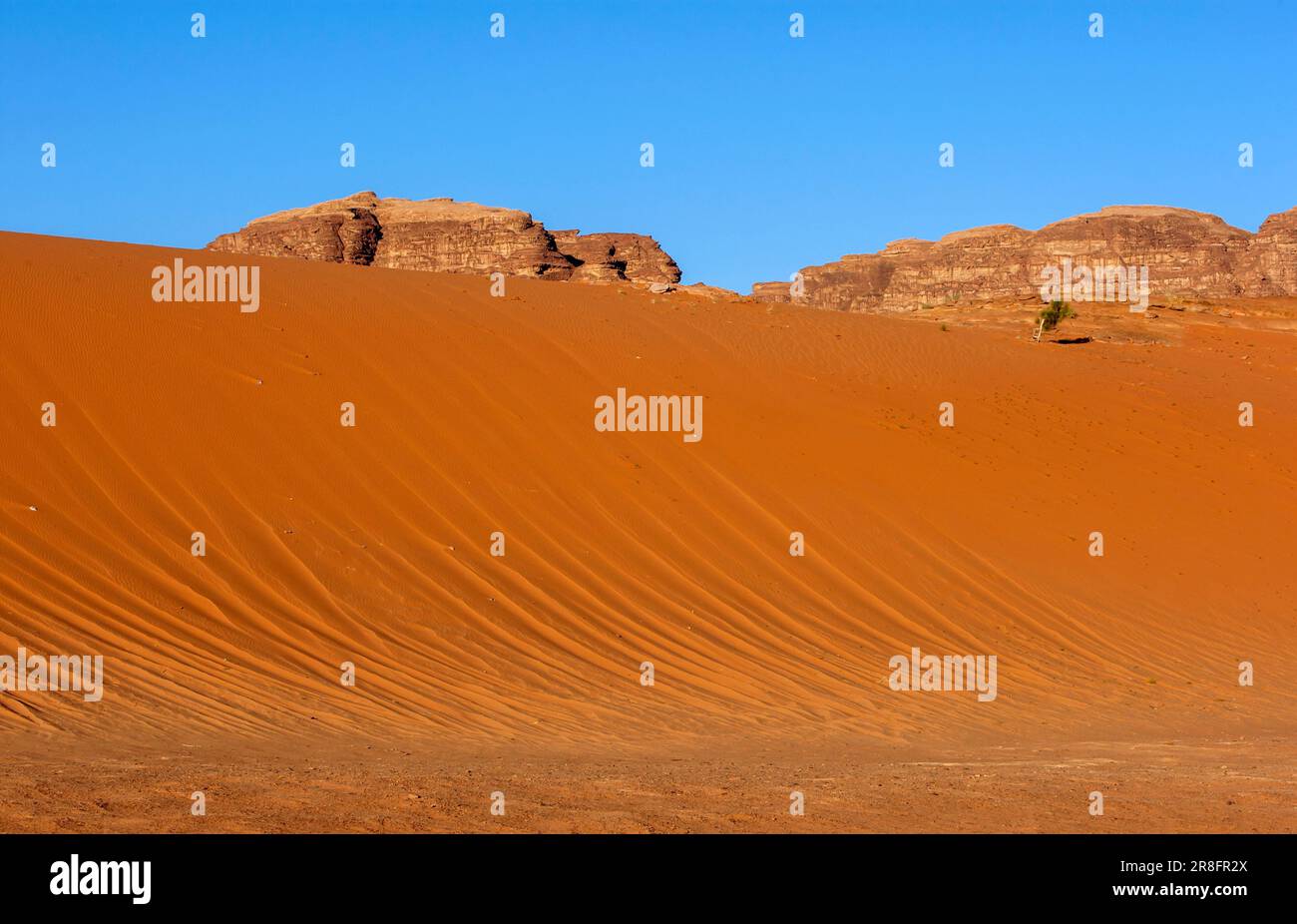 Sunrise over a section of Wadi Rum in Jordan. Also known as the Valley ...