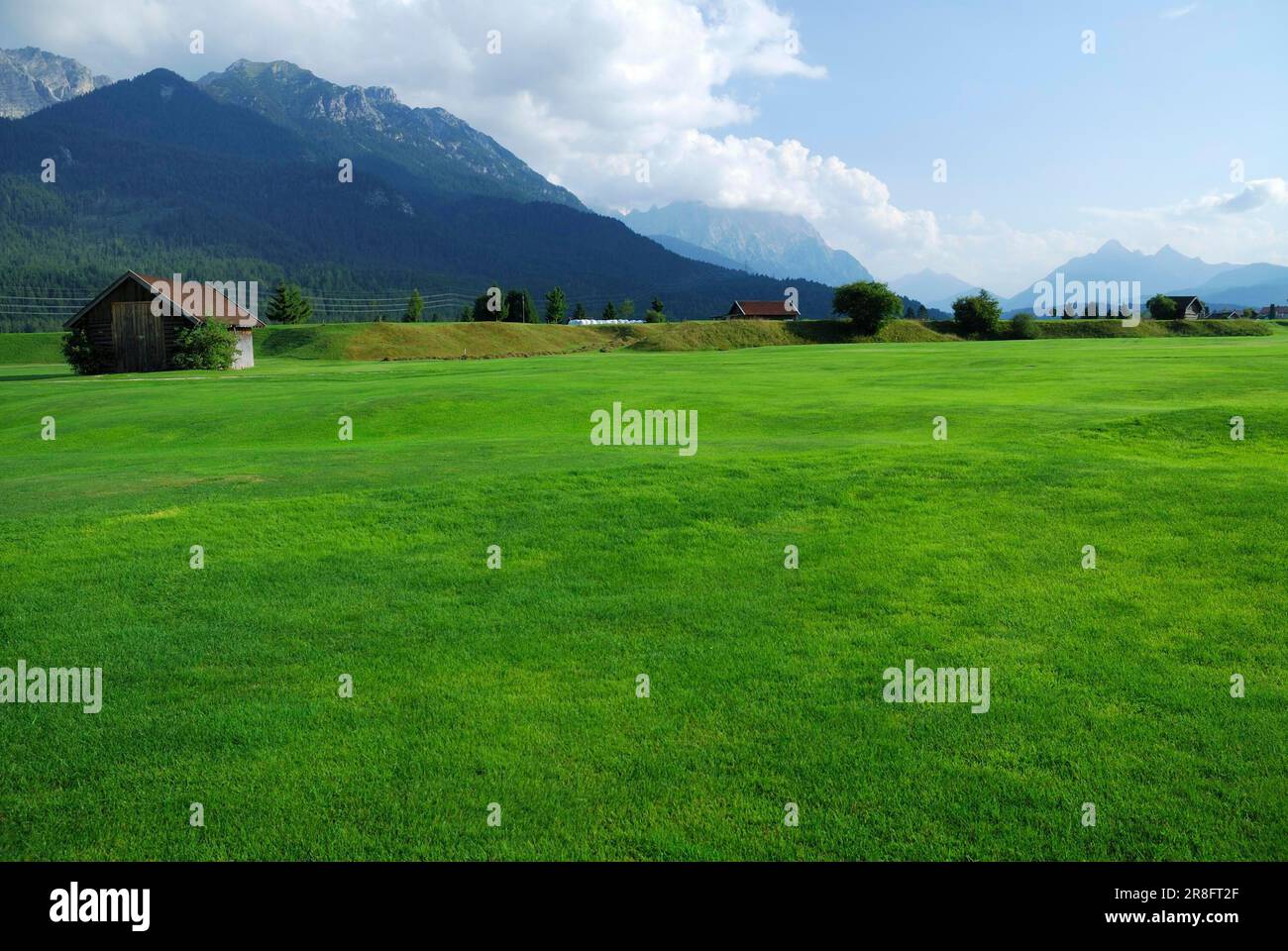 Golf green in the alps Stock Photo - Alamy