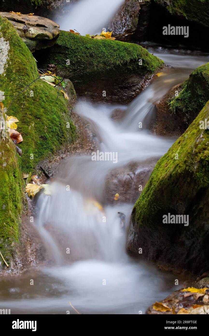 Cool water streaming down Stock Photo - Alamy