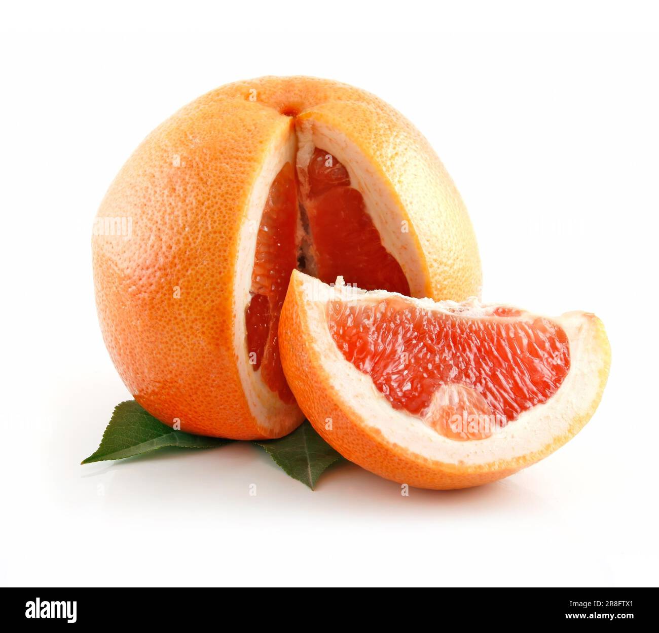 Ripe Sliced Wet Grapefruit with Leaves Isolated on White Background ...
