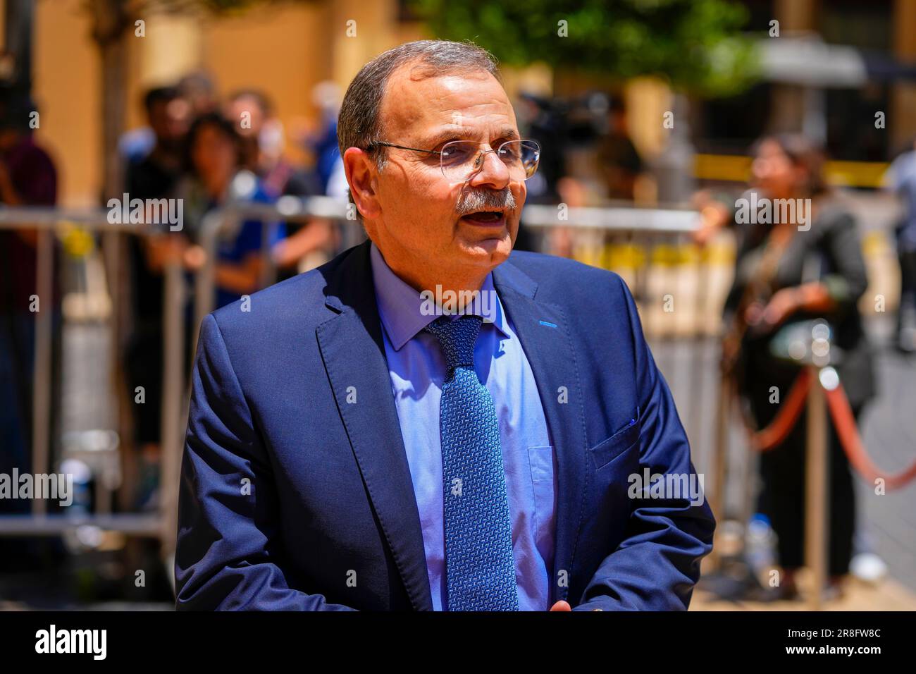 Lebanese lawmaker Abdul Rahman Bizri speaks to journalists as he leaves ...