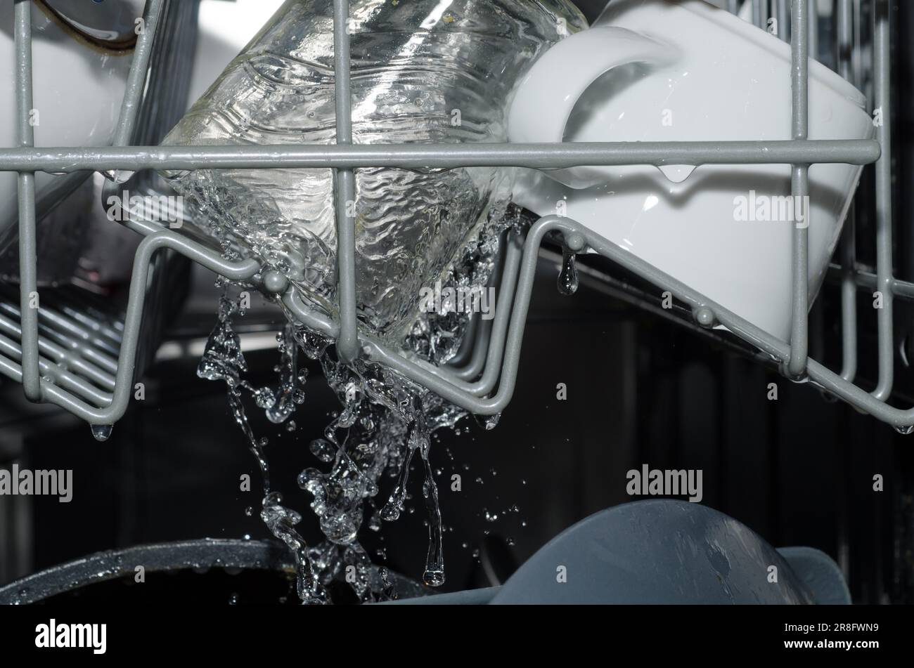 Dirty Dishes in the Washing Machine Stock Photo - Alamy