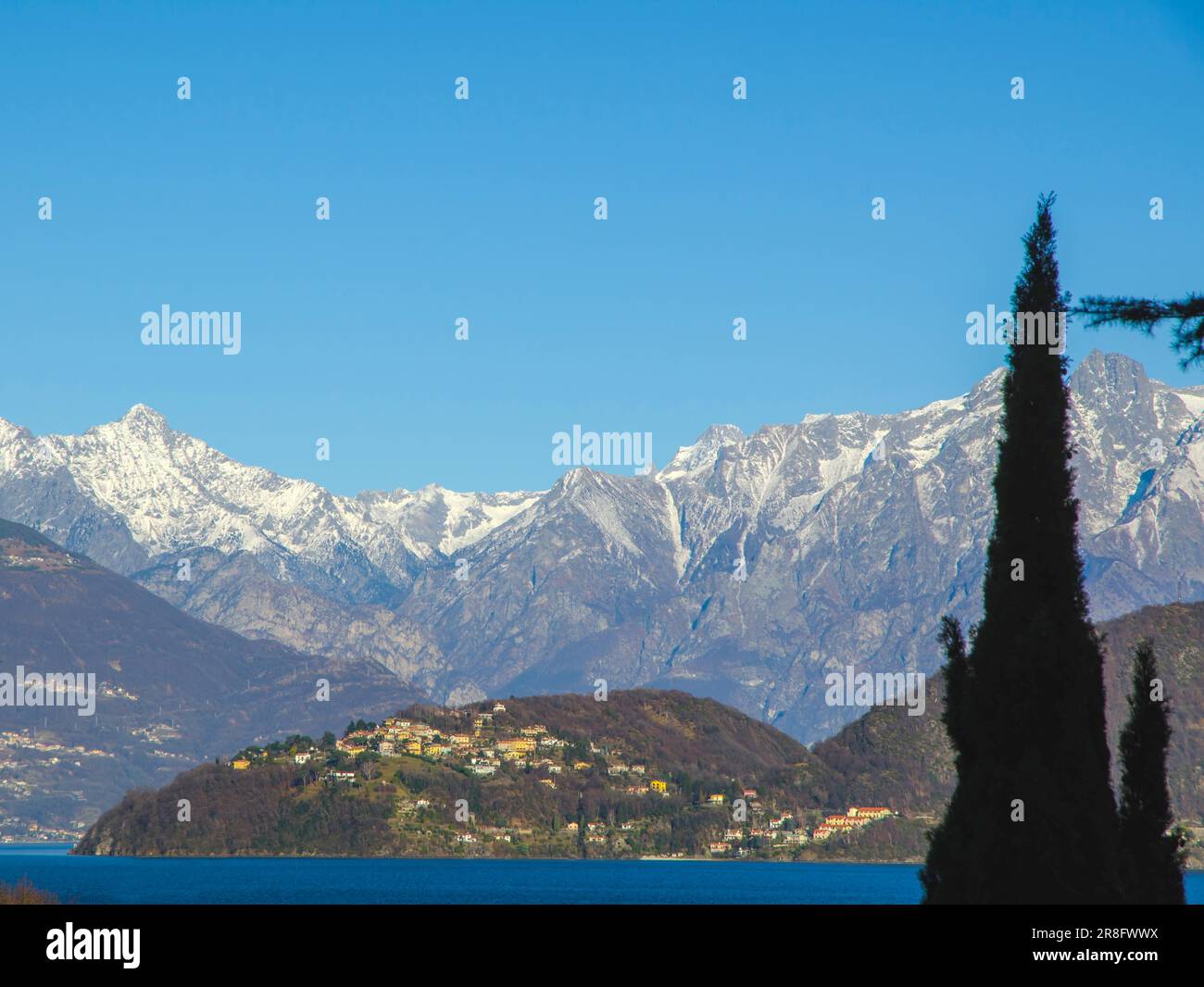 Village on Lake Como with Snow-capped Mountain in Lombardy, Italy Stock ...