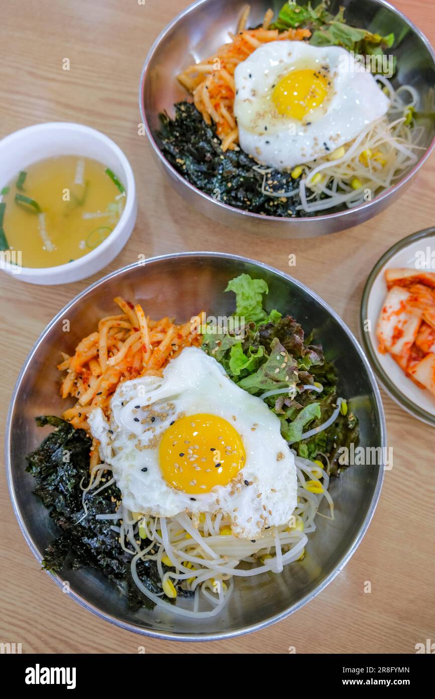 Bibimbap, a traditional Korean food, is a bowl of rice mixed with ...