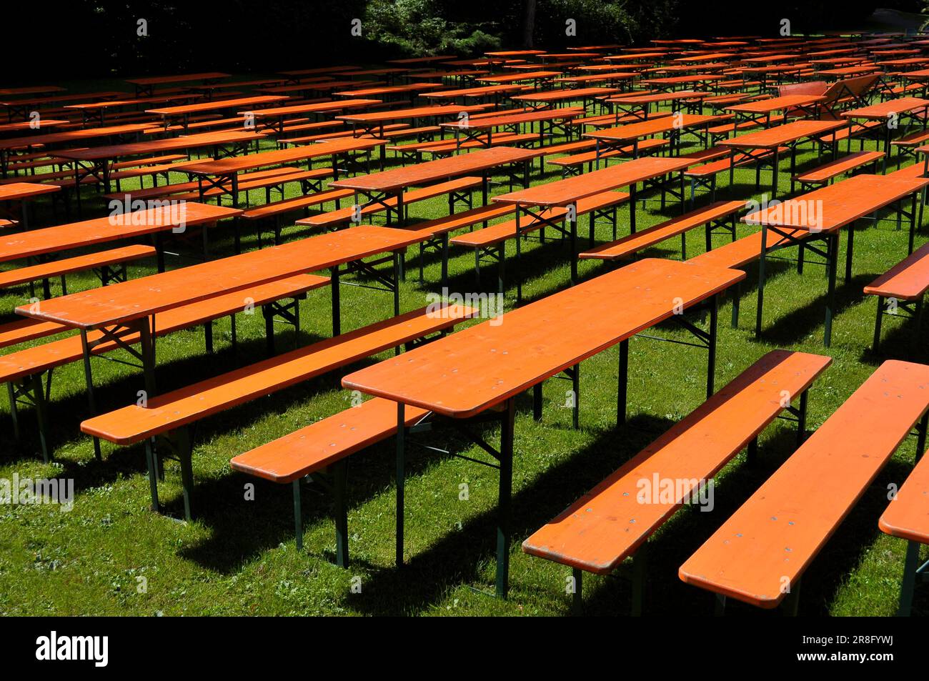 Beer tables with benches Stock Photo - Alamy