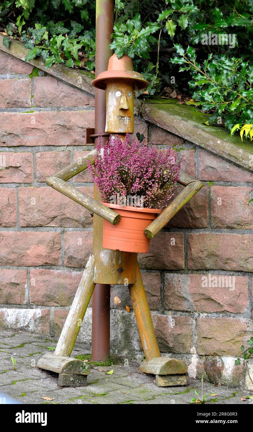Garden Figure with Erika, Wooden Figure Stock Photo - Alamy