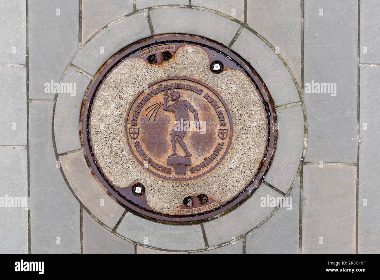Manhole cover with the landmark Koblenz Schaengel, Koblenz, Rhineland ...