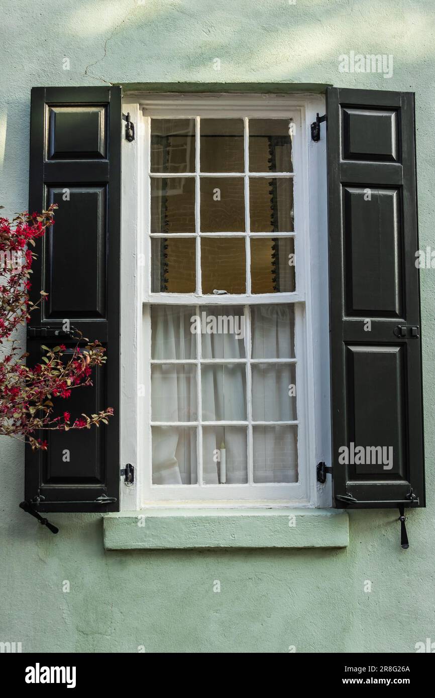 Close up of the color windows of a colonial era home in Charleston ...