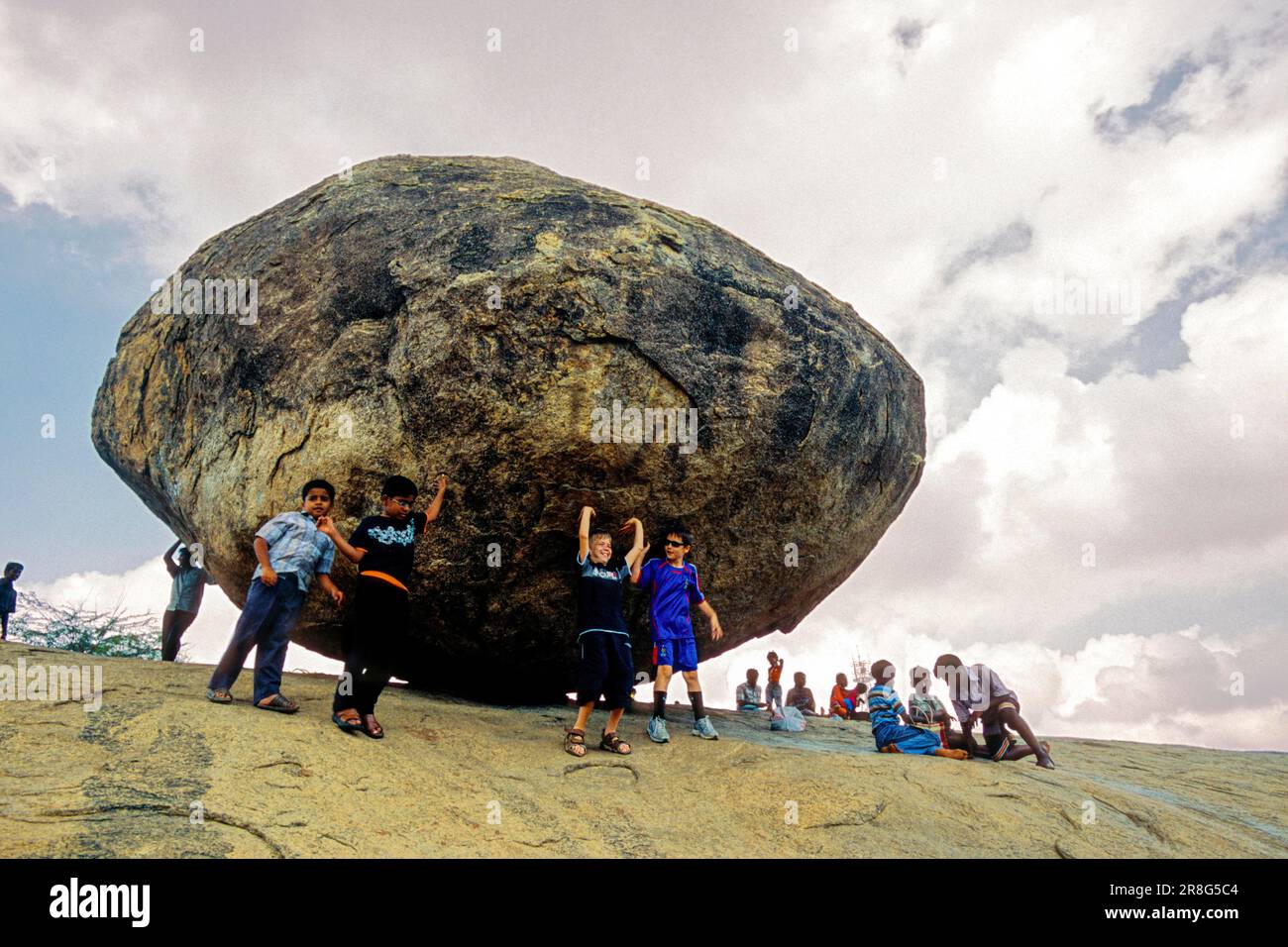 A perfectly balanced huge boulder resting on slender rock-base known as ...