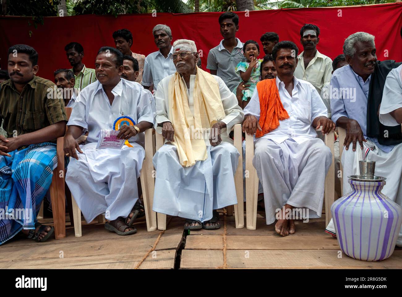 Village elders watching kidaai Muttu Goat fighting near Madurai, Tamil ...