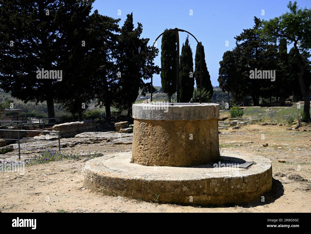 Ancient stone well at the Archaeological site Valley of the Temples in ...