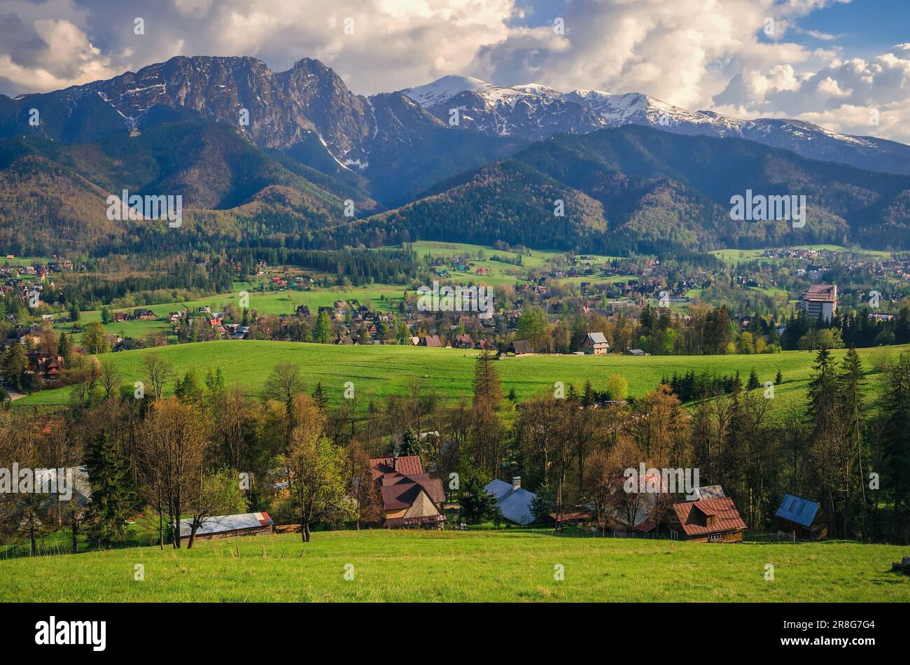 Beautiful country view with mountains in the background. View of the ...