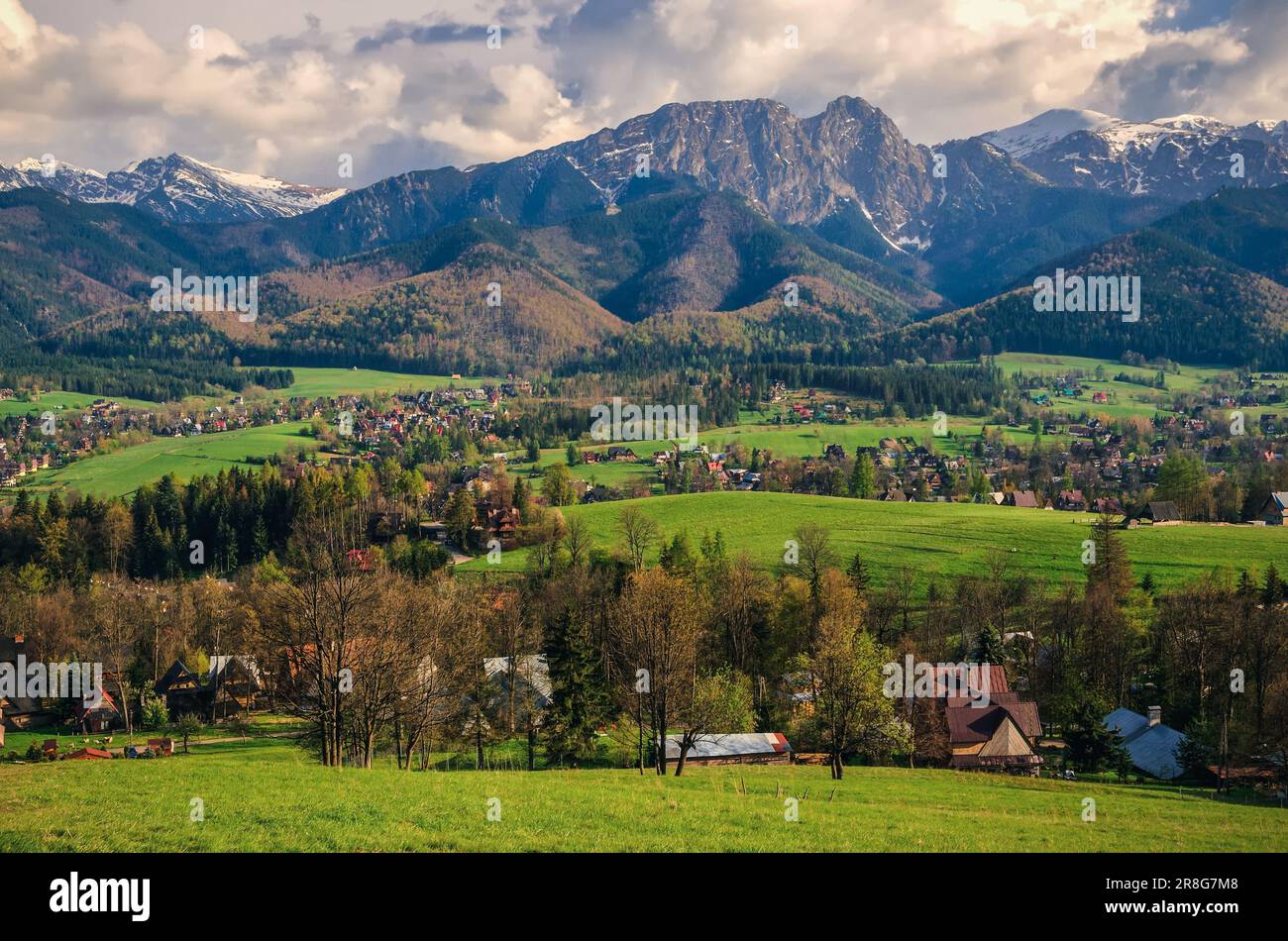 Beautiful country view with mountains in the background. View of the ...