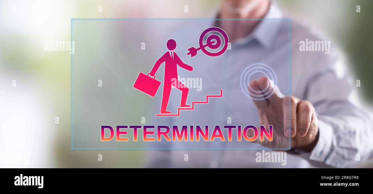 Man touching a determination concept on a touch screen with his finger ...