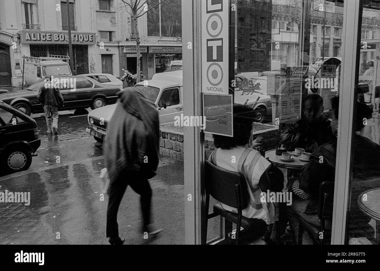 Paris street in rainy weather Black and White Stock Photos & Images - Alamy
