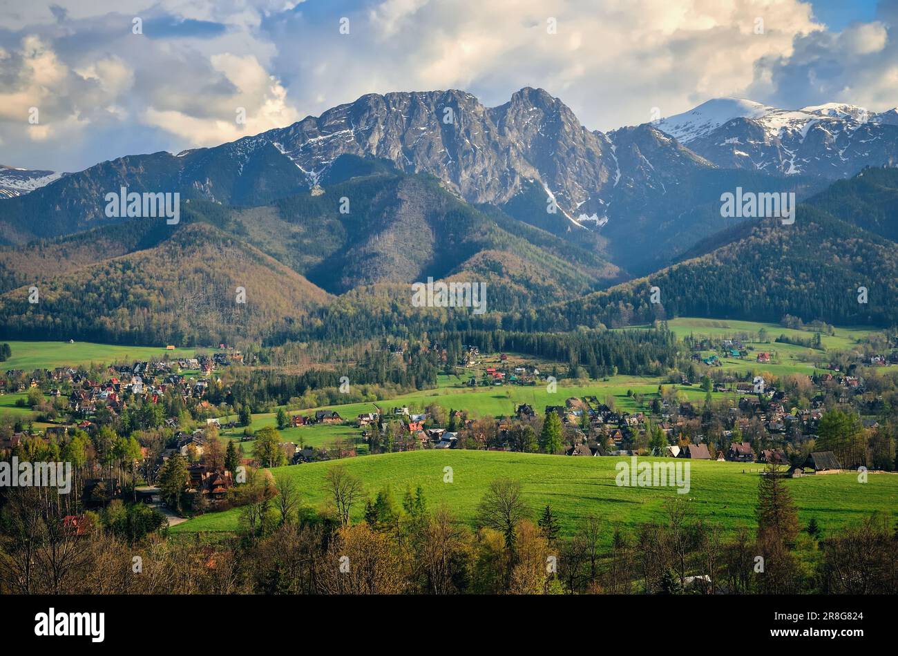 Beautiful country view with mountains in the background. View of the ...