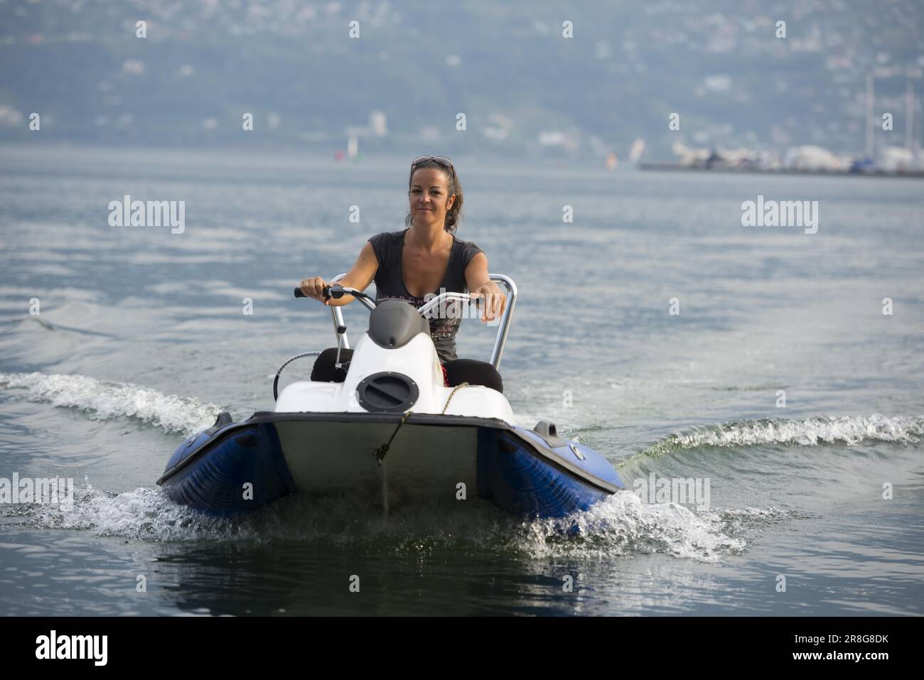 Woman on a jet ski hi-res stock photography and images - Alamy