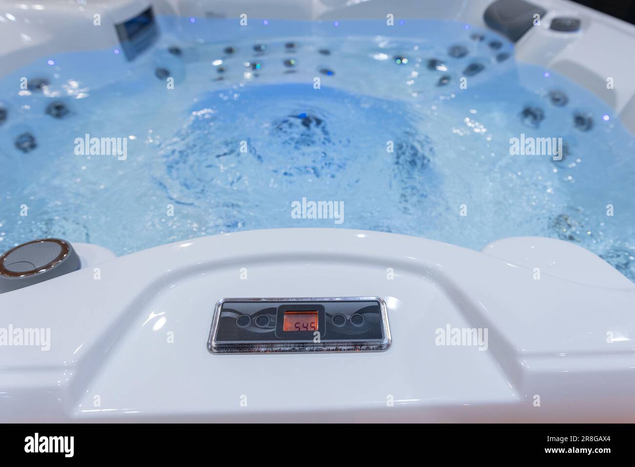 Ultra-modern swimming pool with Jacuzzi function. Mid shot Stock Photo ...