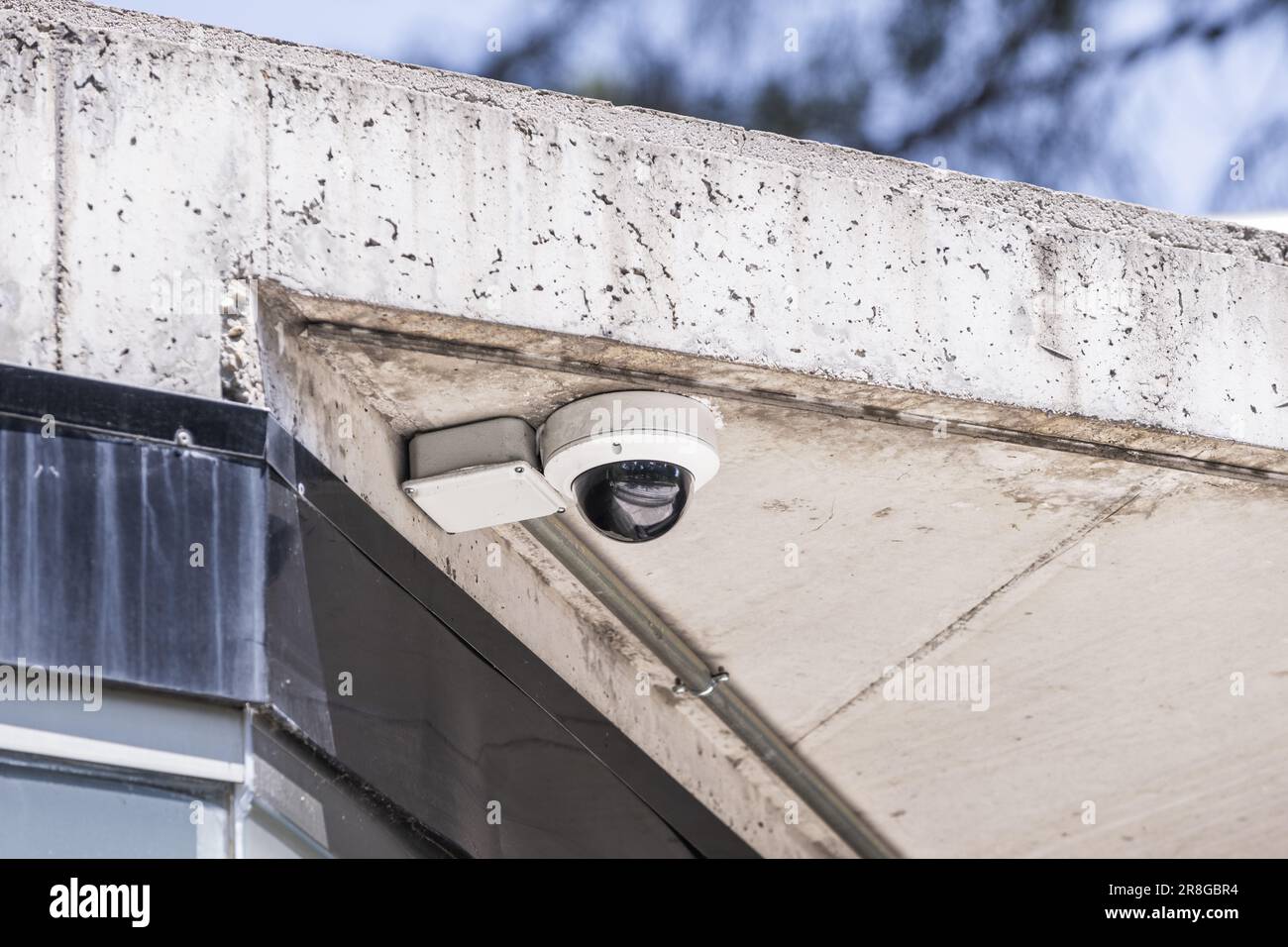 Surveillance camera placed on an exterior concrete roof Stock Photo - Alamy