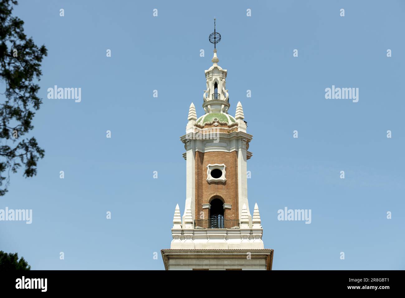 Pinnacle of a building with brick, white stone and green tiles Stock ...