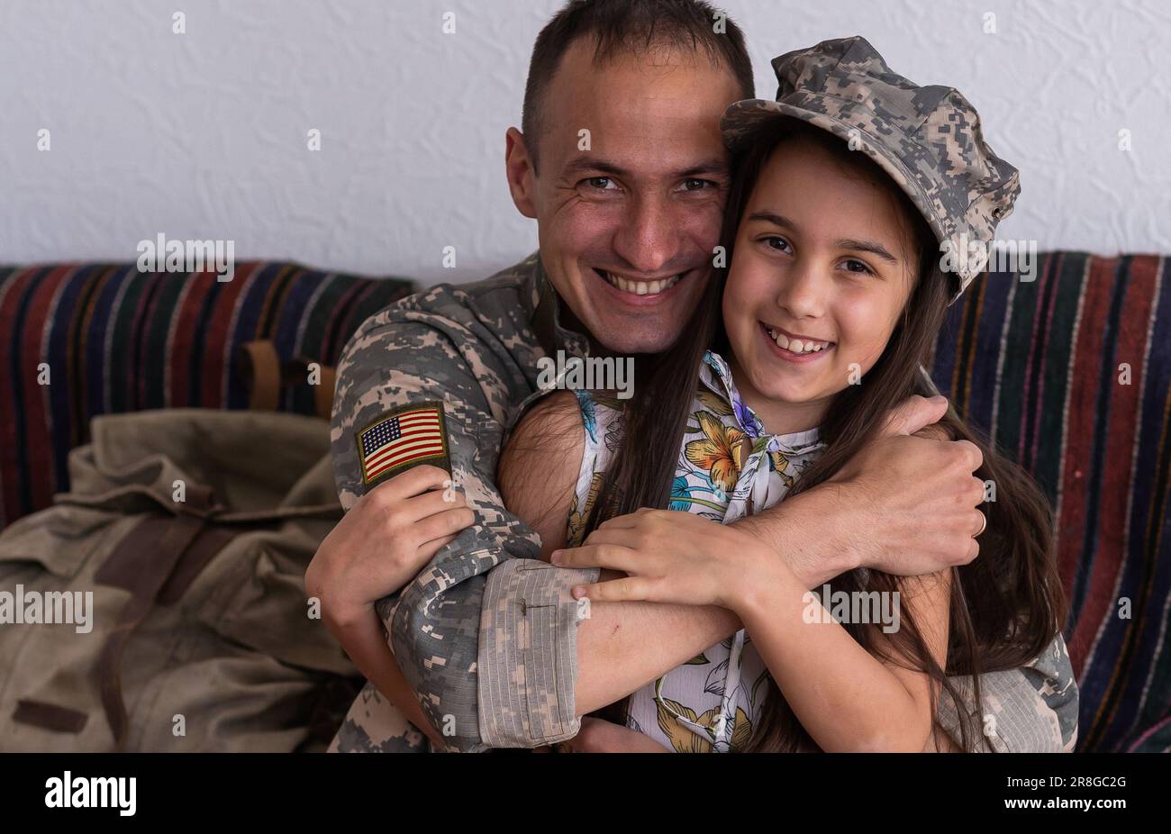 American soldier coming back home to his family Stock Photo - Alamy
