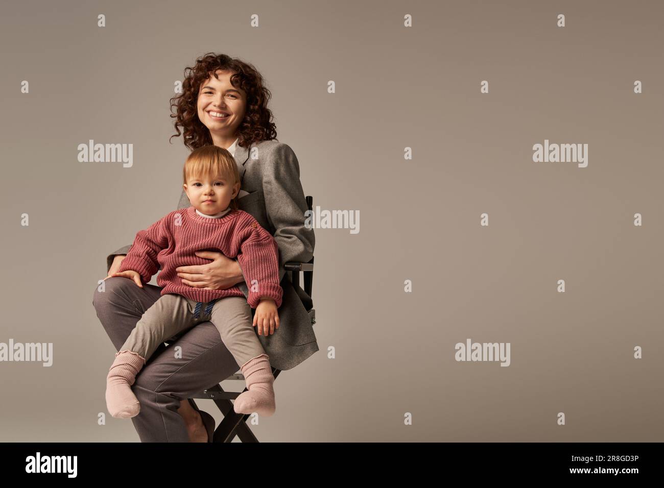 balanced lifestyle, career and family, curly businesswoman sitting on ...